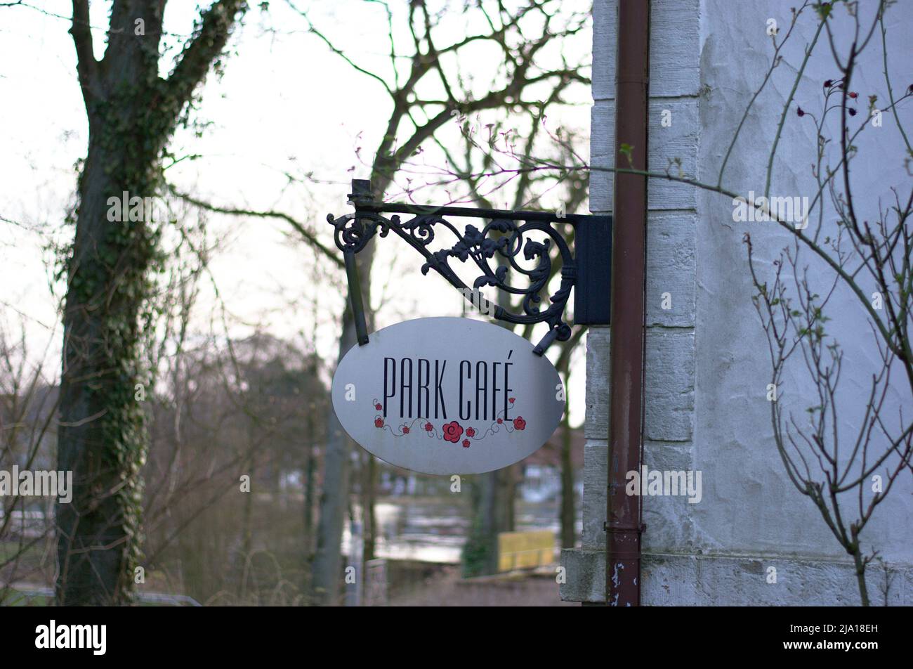 Sign Park Cafe White Red Wall Trees Sky White Stock Photo - Alamy