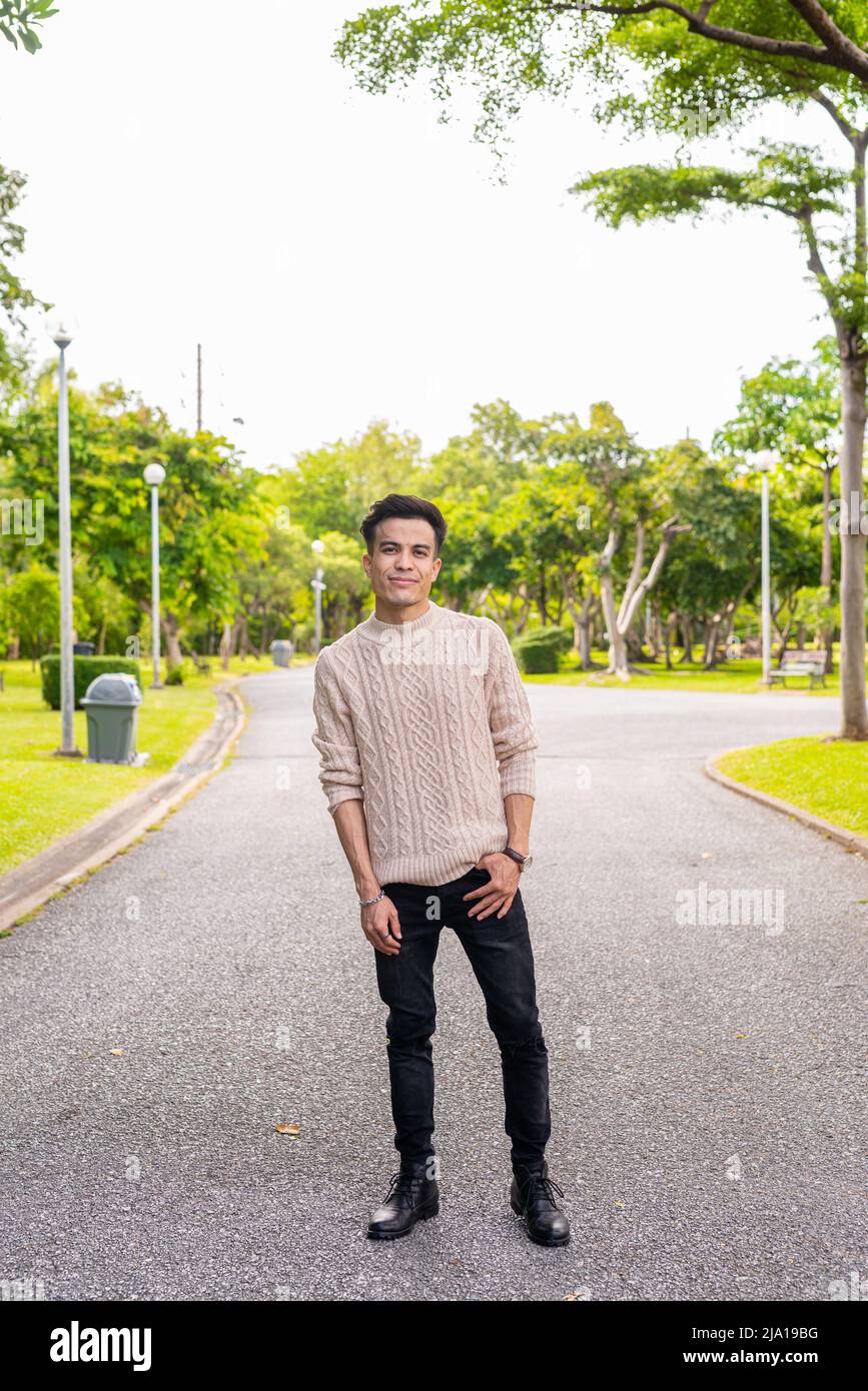 Young male man walking in hi-res stock photography and images - Alamy