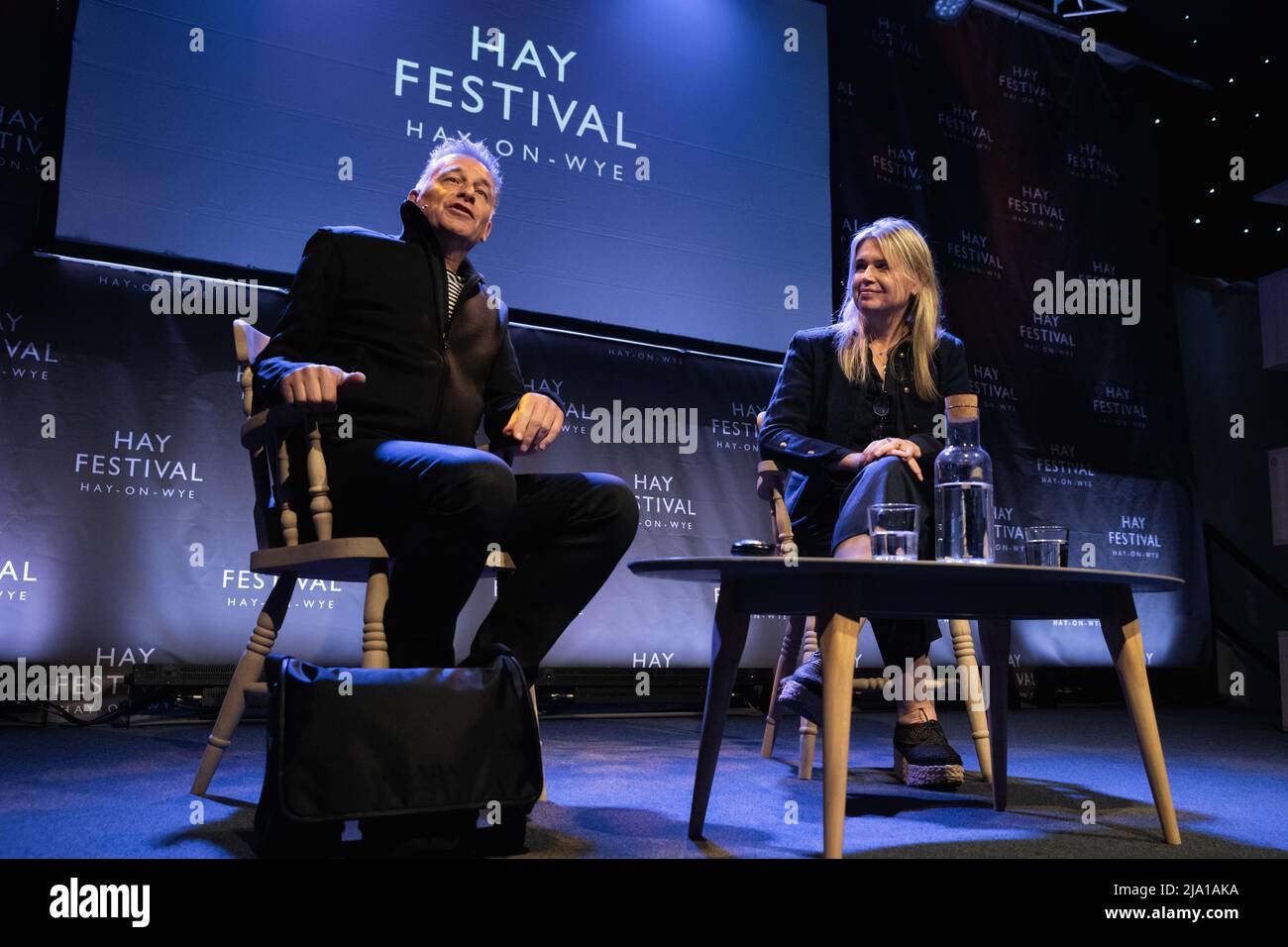 Hay-on-Wye, Wales, UK. 26th May, 2022. Jenny Packham talks to brother ...
