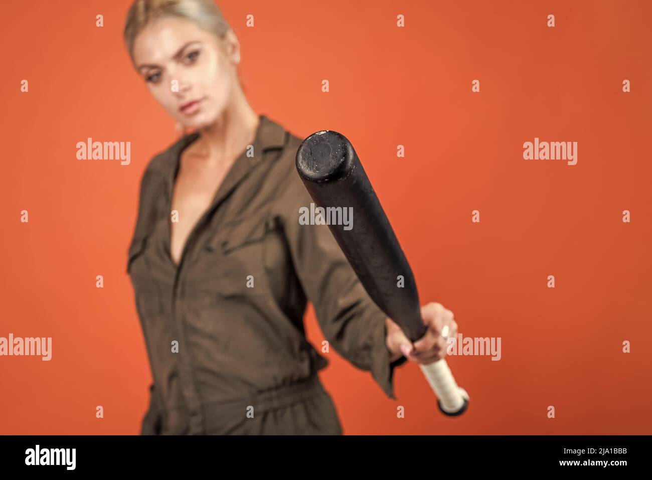 baseball bat in hand of woman. female baseball player. sports and games ...