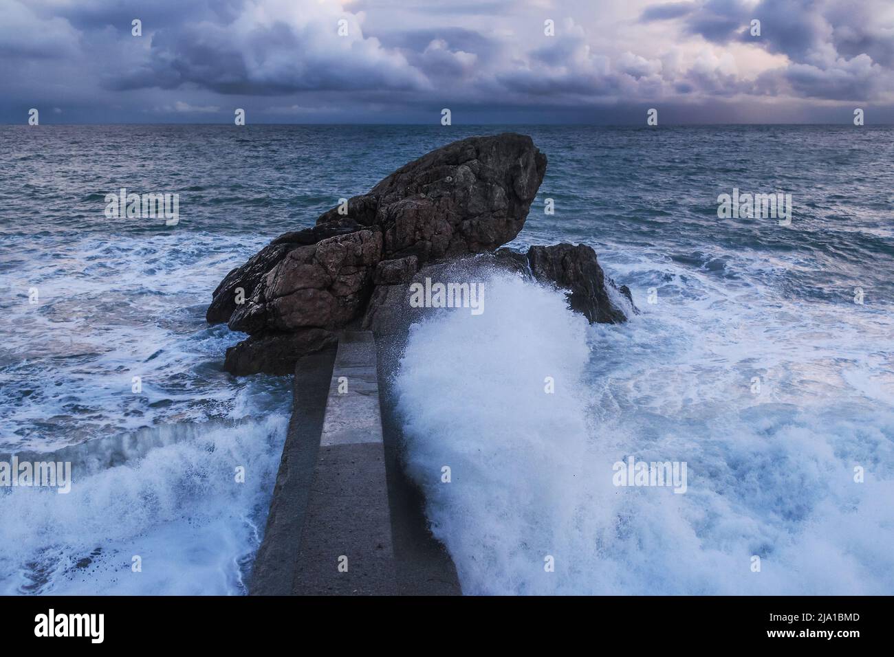 Storm at sea with waves during rain and cloudy in spring in Alupka ...