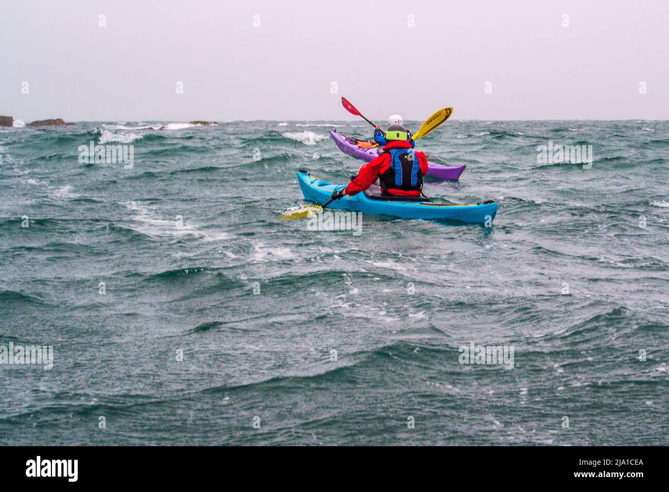 Sea kayaking off Anglesey, North Wales Stock Photo - Alamy