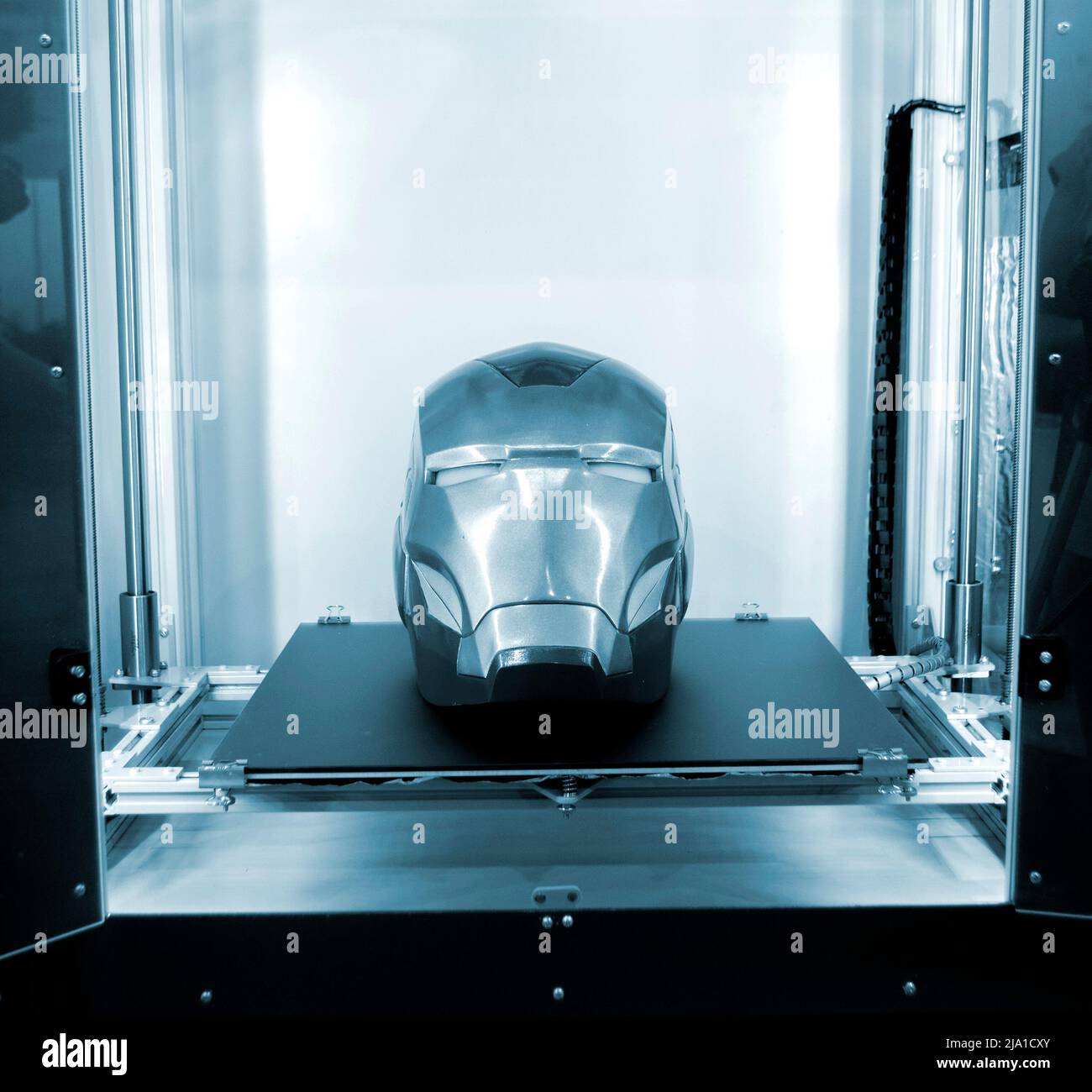 Object printed on 3D printer, on desktop of 3d printer. Progressive ...