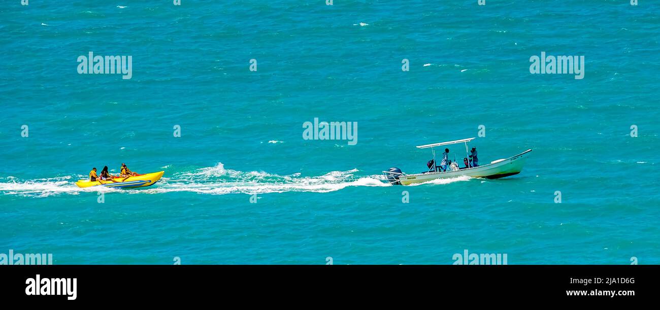banana boat ride off Isla Verde Beach on the Atlantic Ocean in the ...