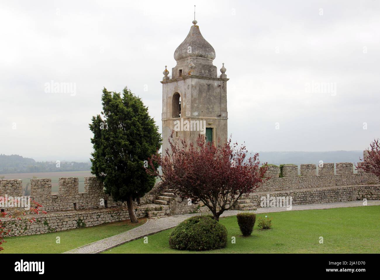Baroque clock tower built into the earlier medieval castle wall ...