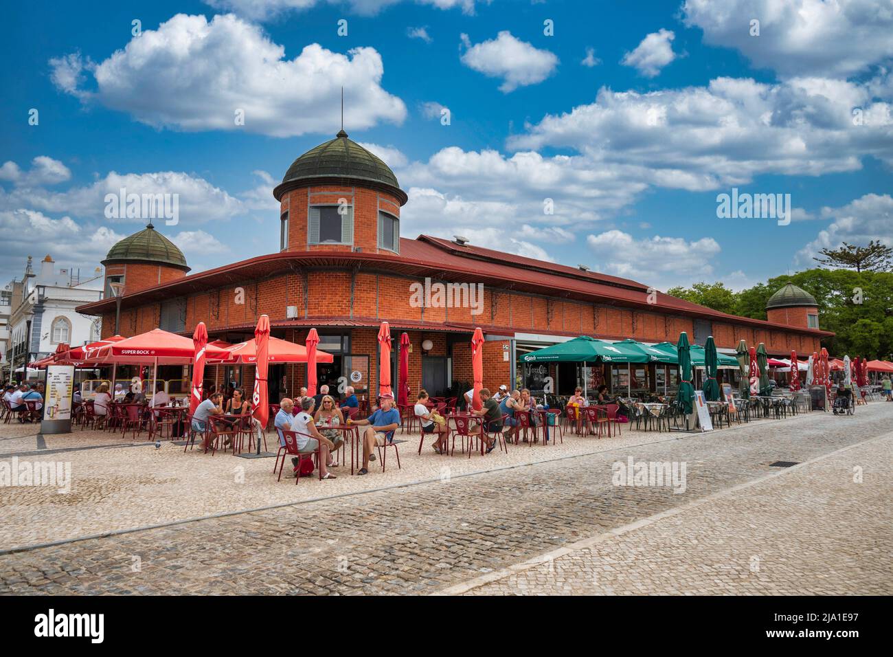 Traditional red-brick market building in Olhão, Algarve, Portugal ...