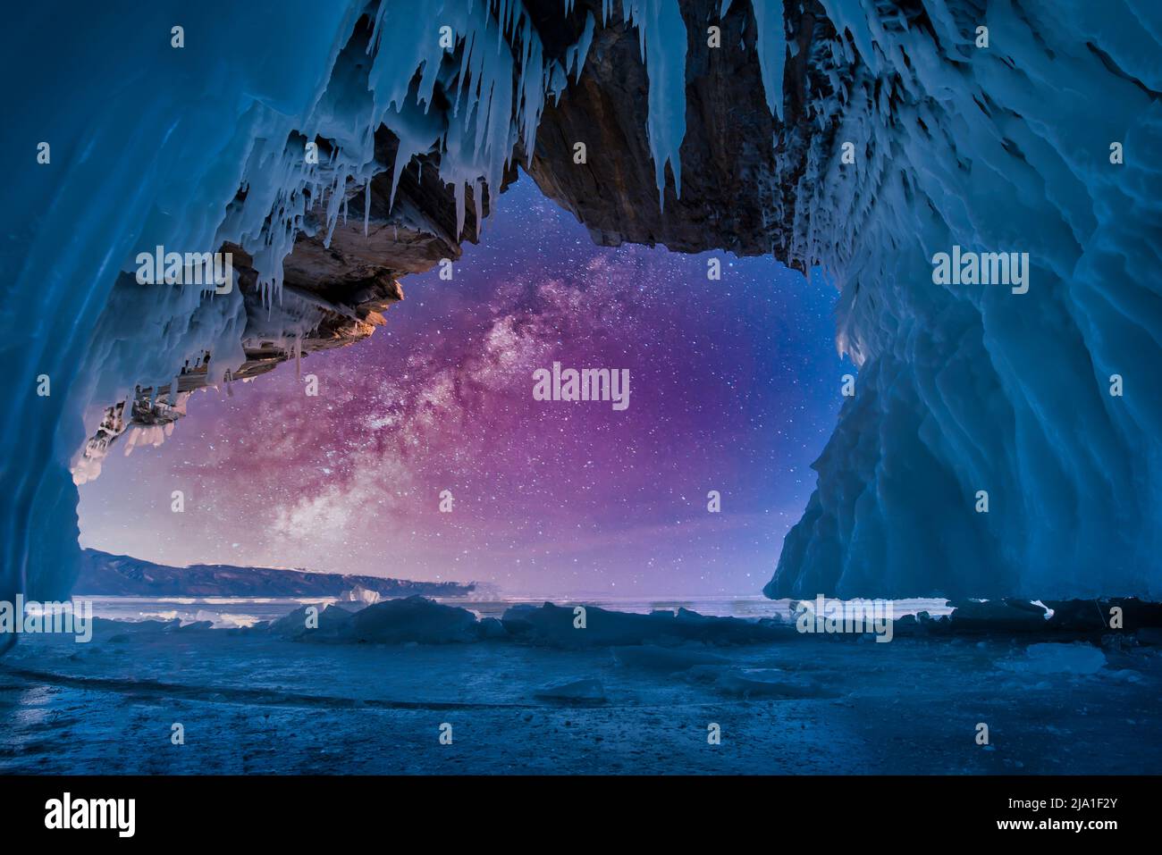 Landscape of milky way on sky with natural breaking ice inside blue ice ...