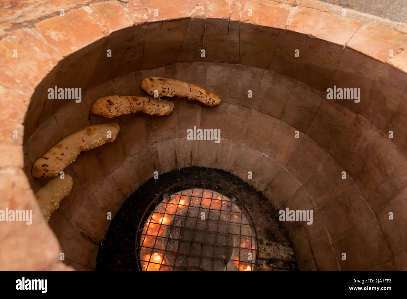 Georgian khachapuri in Megrelian baked in tandoor. Khachapuri with ...