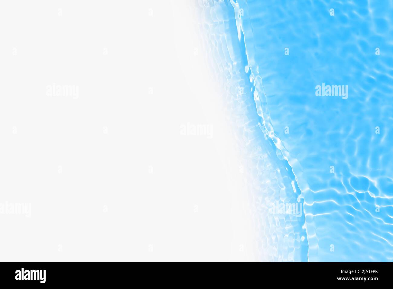 Surface of blue swimming pool water with light reflection and waves ...