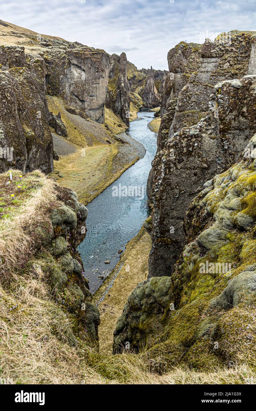 The canyon of Fjaðrárgljúfur is located near Kirkjubæjarklaustur, in ...
