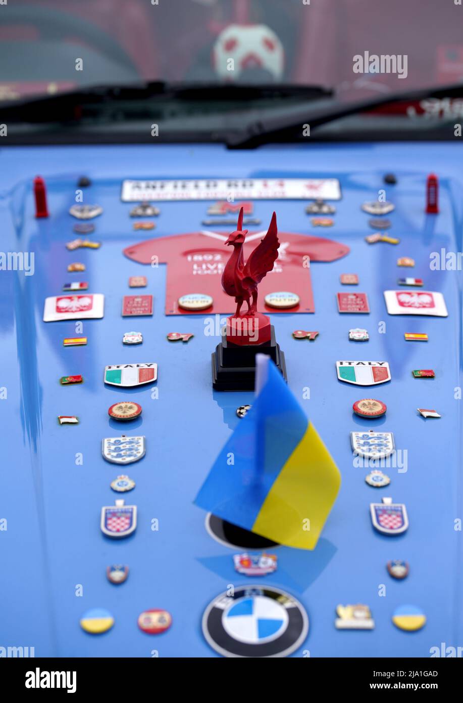 A view of the badges and detail on Mel Singh's car outside The Louvre ...