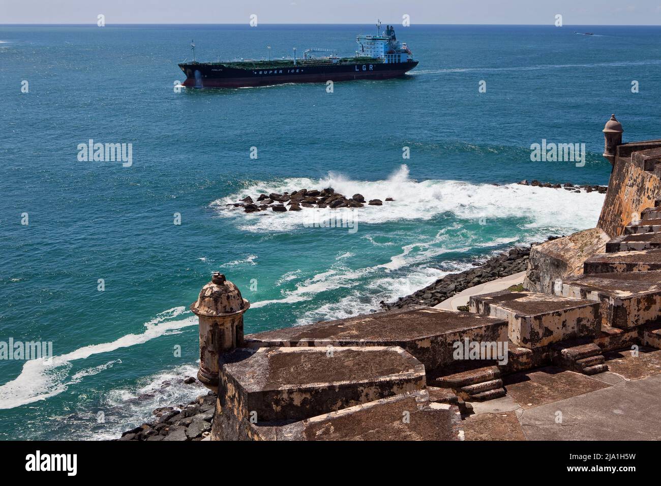 Ship enters Harbor El Morro Fort PR H Stock Photo - Alamy