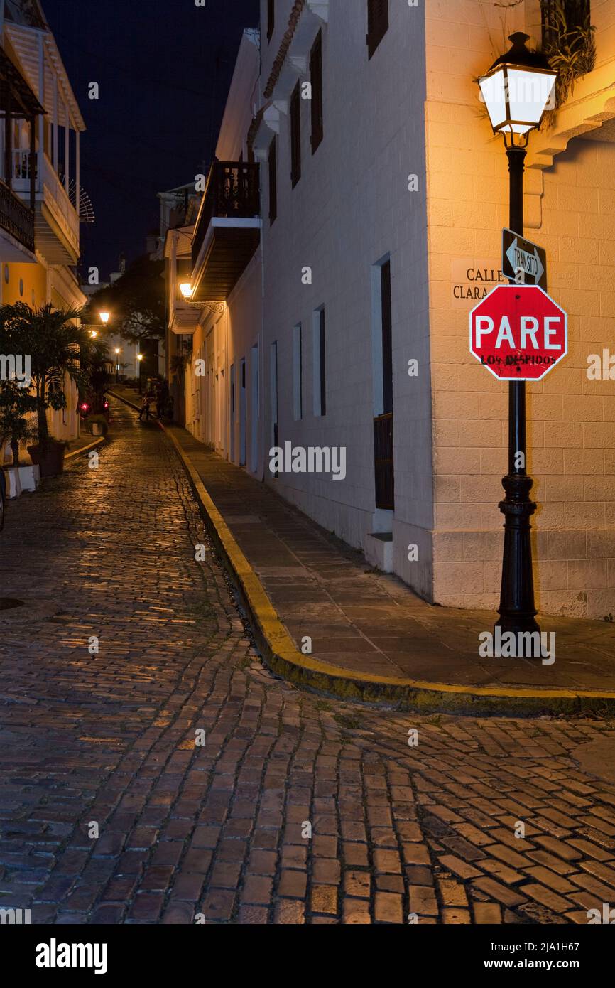 A bright red stop sign contrasts against the muted tones of Old San ...