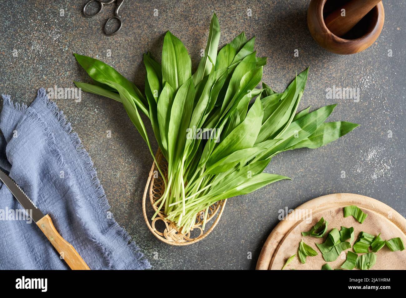 Fresh wild garlic leaves collected in spring on a table, top view Stock ...