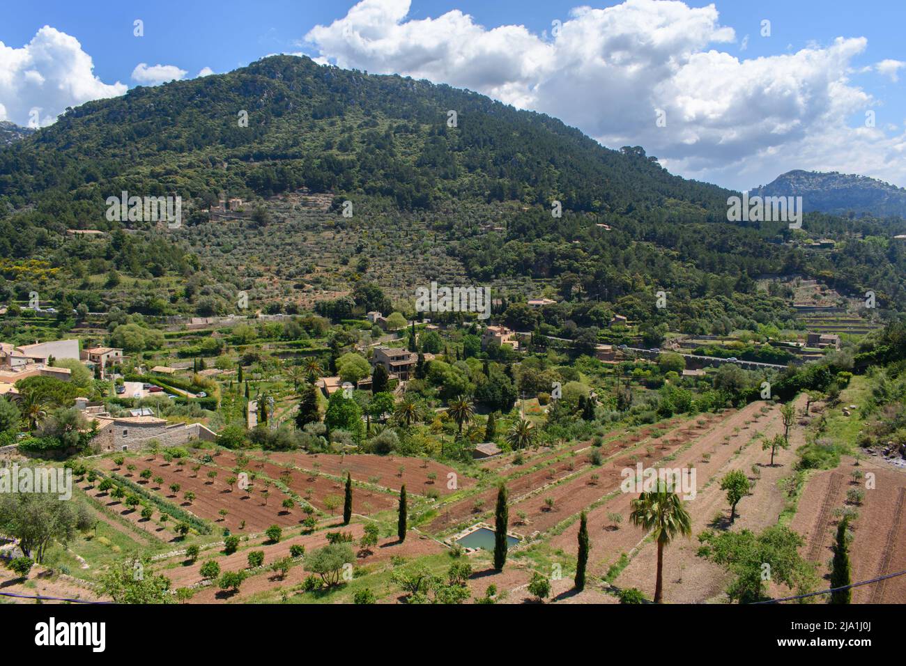 View of mountain and gardens in Valldemossa, Mallorca, Spain. Village ...
