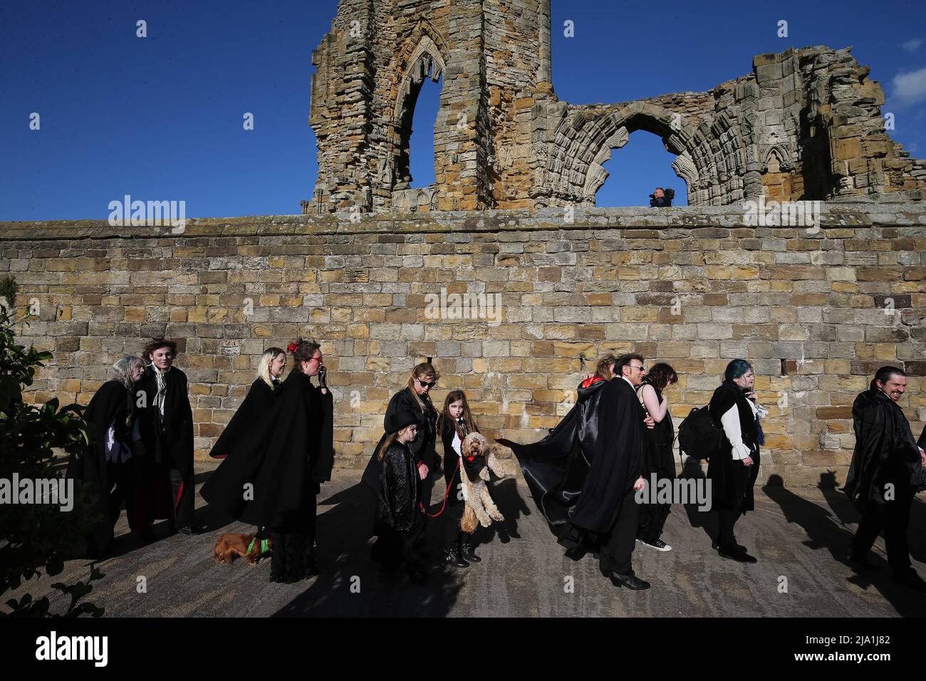 People dressed as Vampires arrive at Whitby Abbey in Whitby, Yorkshire ...