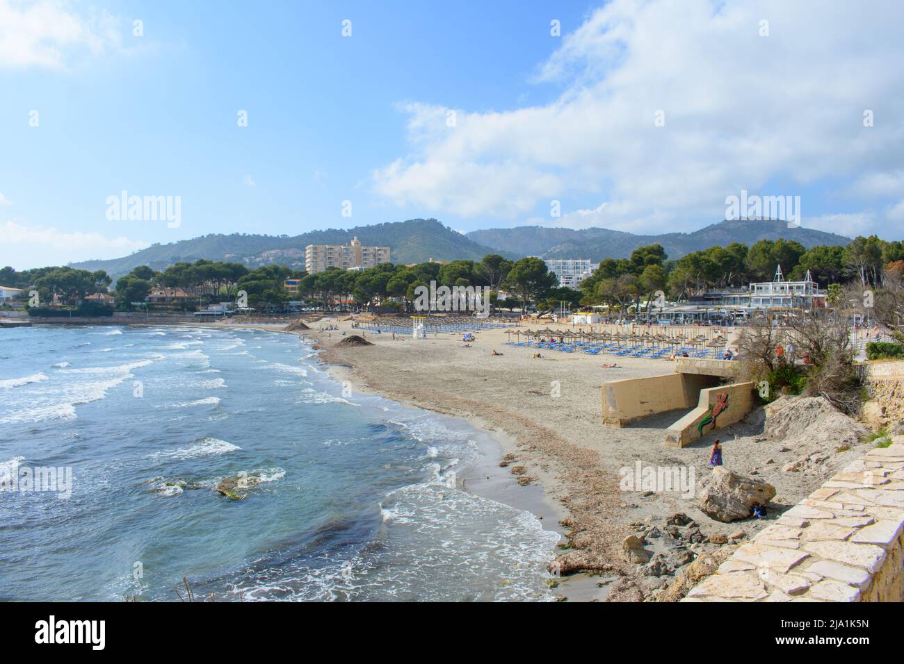 Peguera, Mallorca, Spain - 05.01.2022: People on beach at off-season in ...
