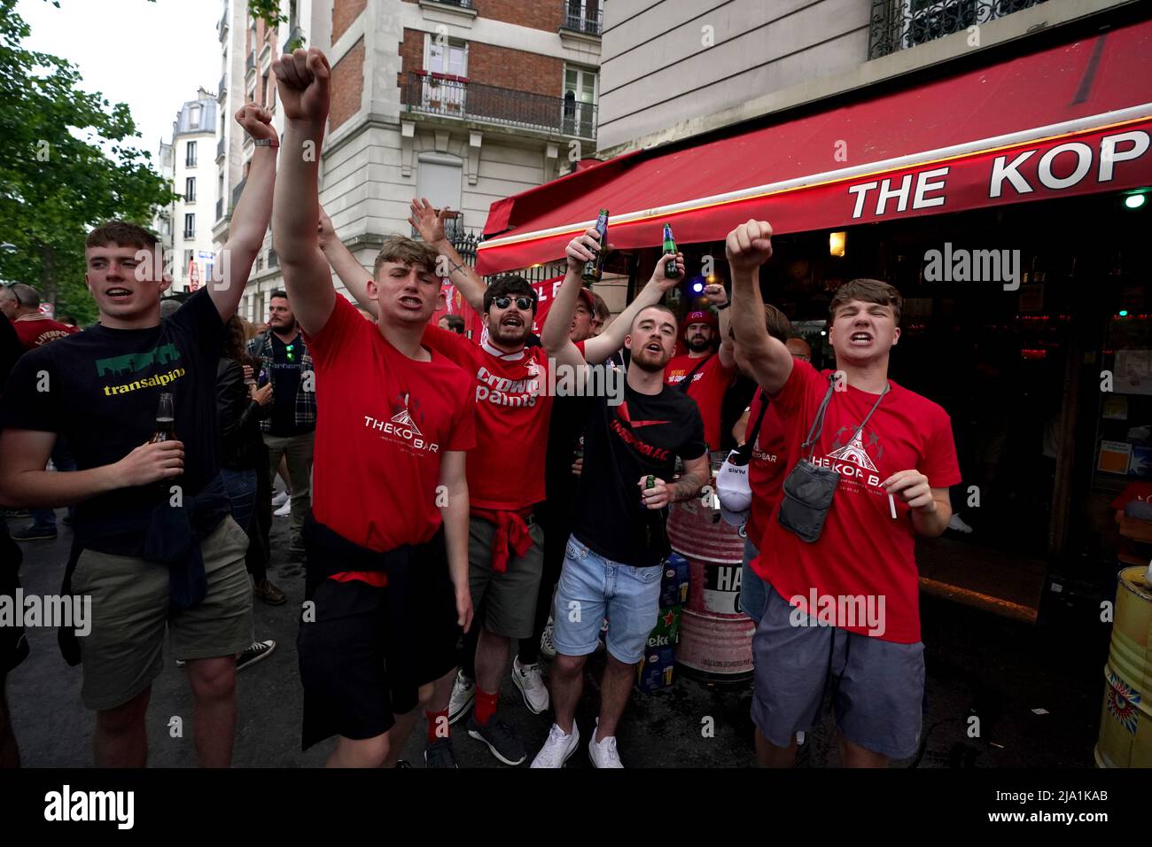 Liverpool fans pose for a photo at The Kop Bar in Paris ahead of ...