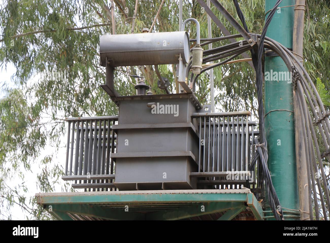 Transformer on a metal pole. Three-phase transformers and rafts on ...