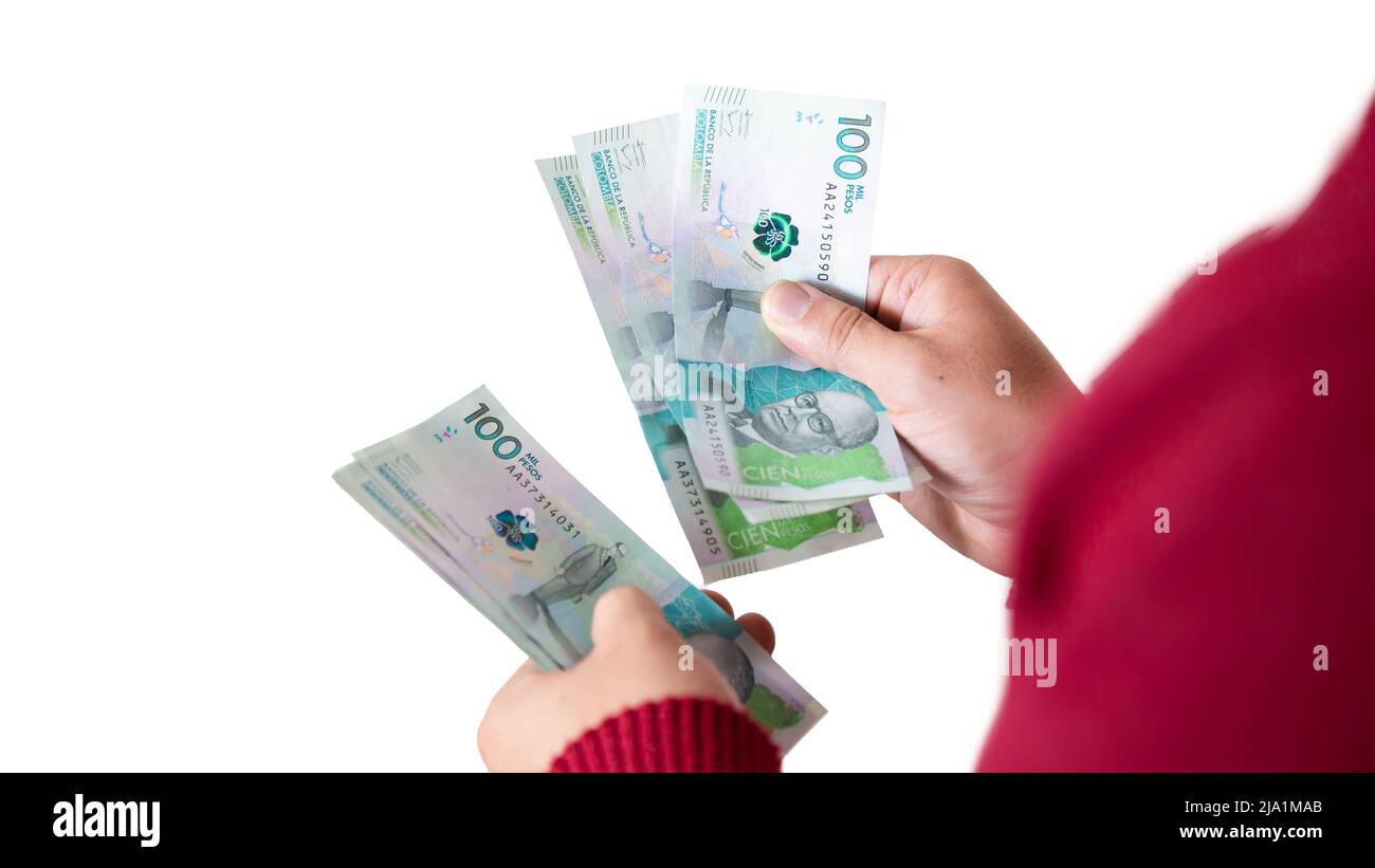 latin man counting colombian money , red sack, businessman or ...