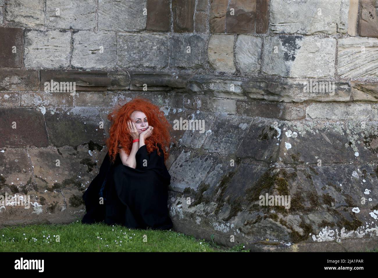 A person dressed as Vampire at Whitby Abbey in Yorkshire, at a attempt ...