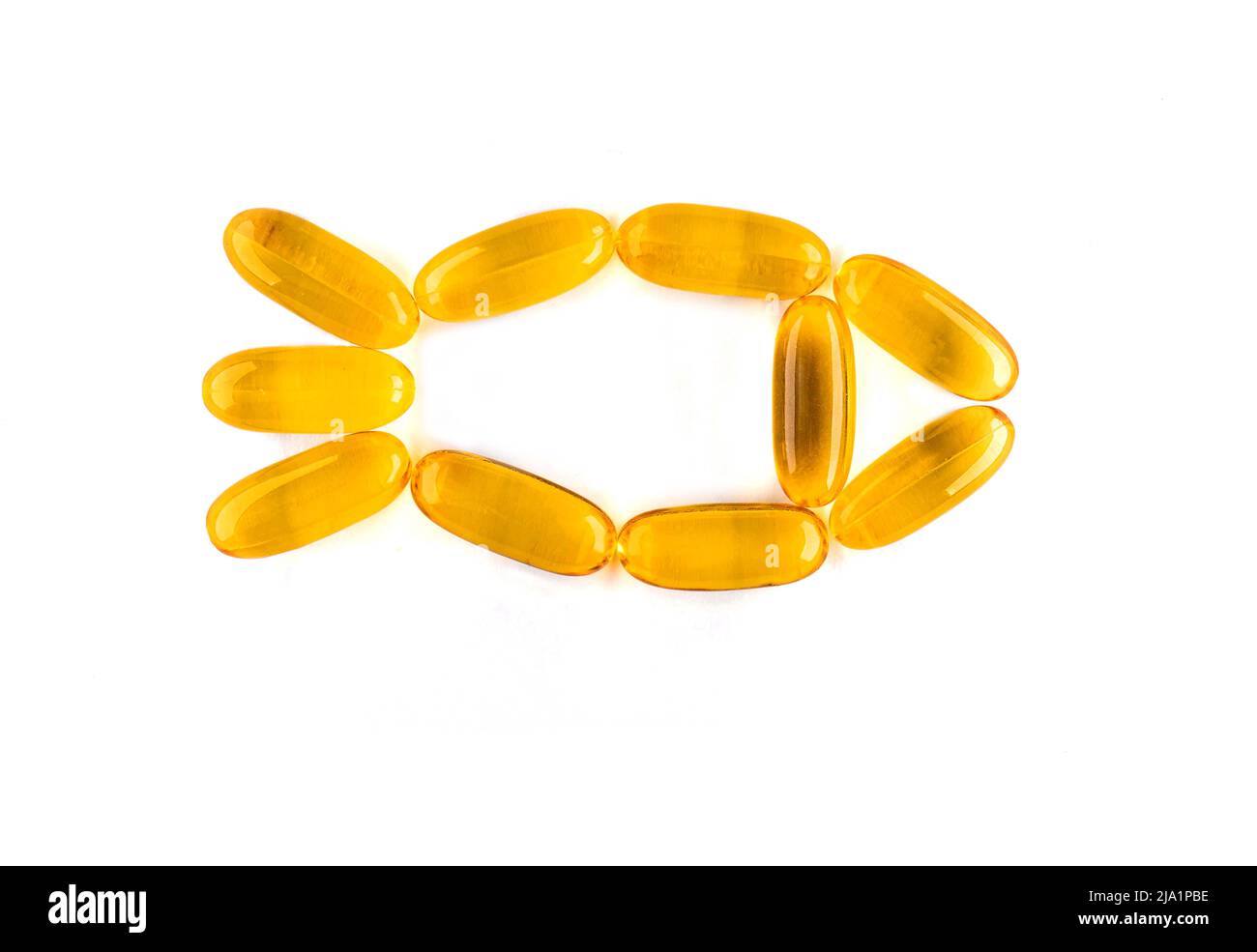 Omega 3. Oily fish, in capsules, on a white background. Healthy food ...