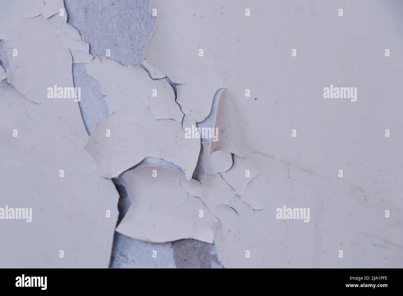 wall paint damage due to moisture in close up Stock Photo - Alamy