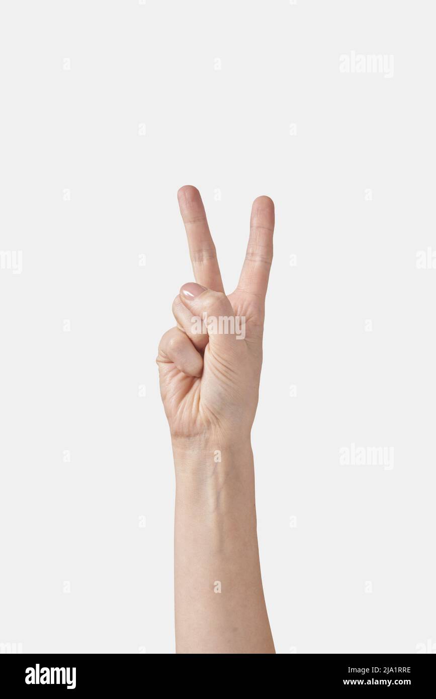 Hand showing two fingers icon hi-res stock photography and images - Alamy