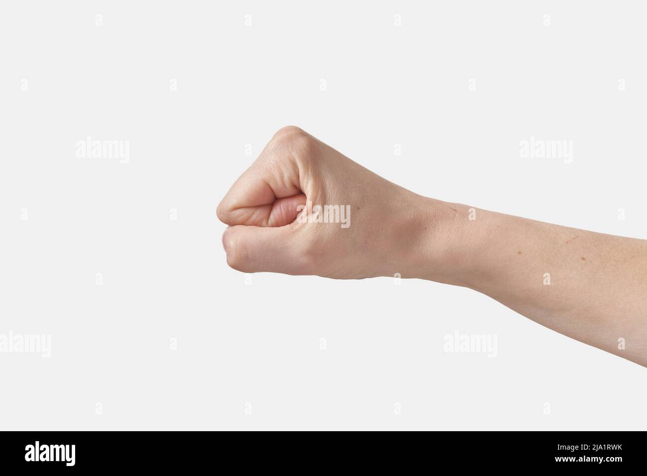 Aggressive symbol of man hand in fist Stock Photo - Alamy