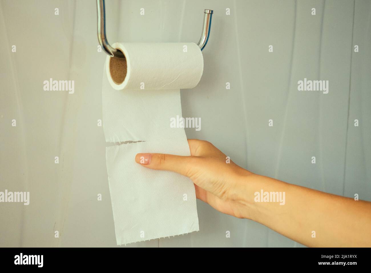 roll toilet paper. concept of diarrhea and indigestion of the stomach ...