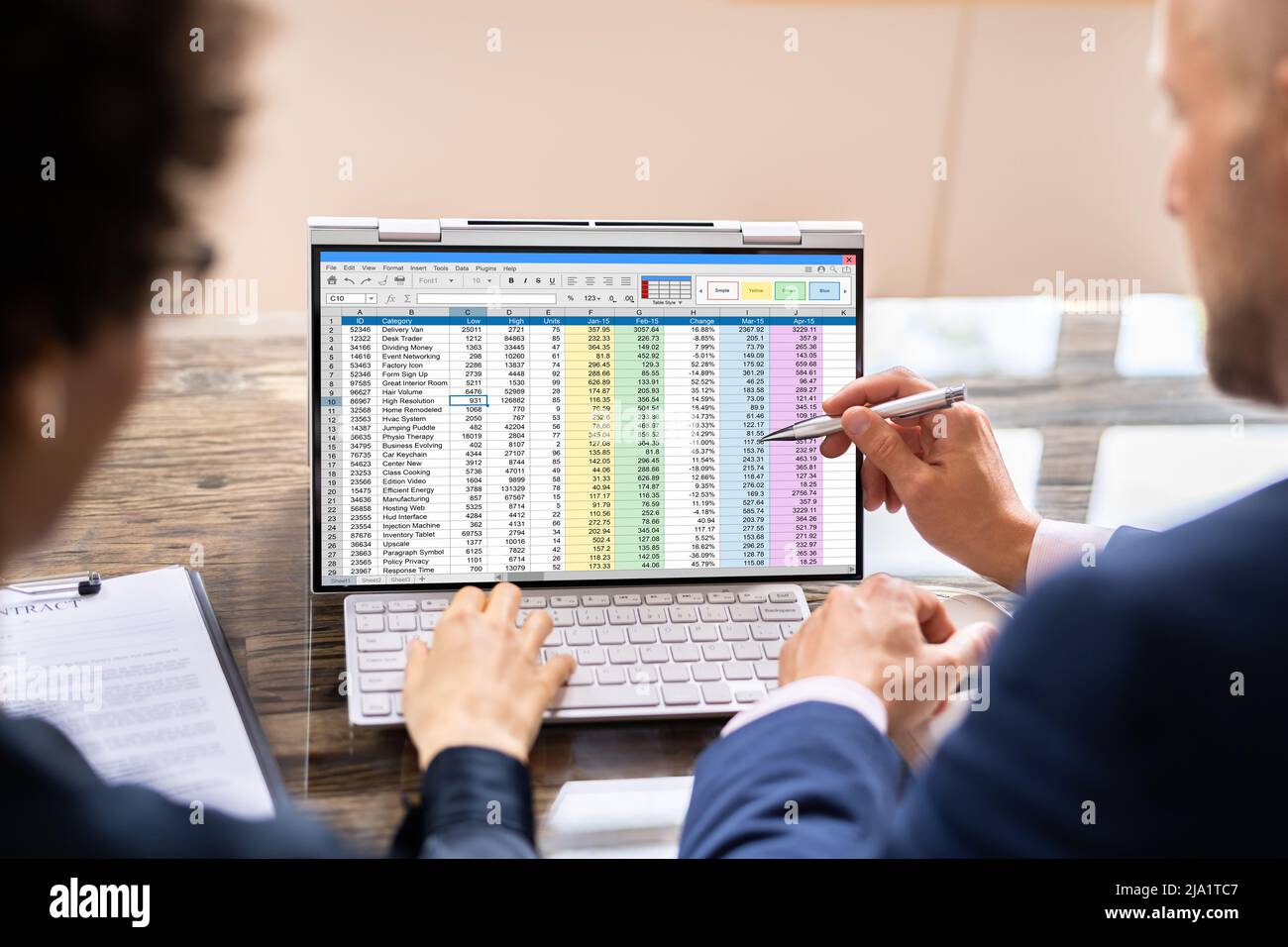 Analyst Employee Working On Spreadsheet Using Desktop Computer Stock ...