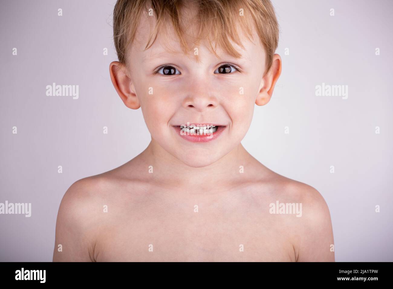 Loss of the first baby tooth in a child Stock Photo - Alamy