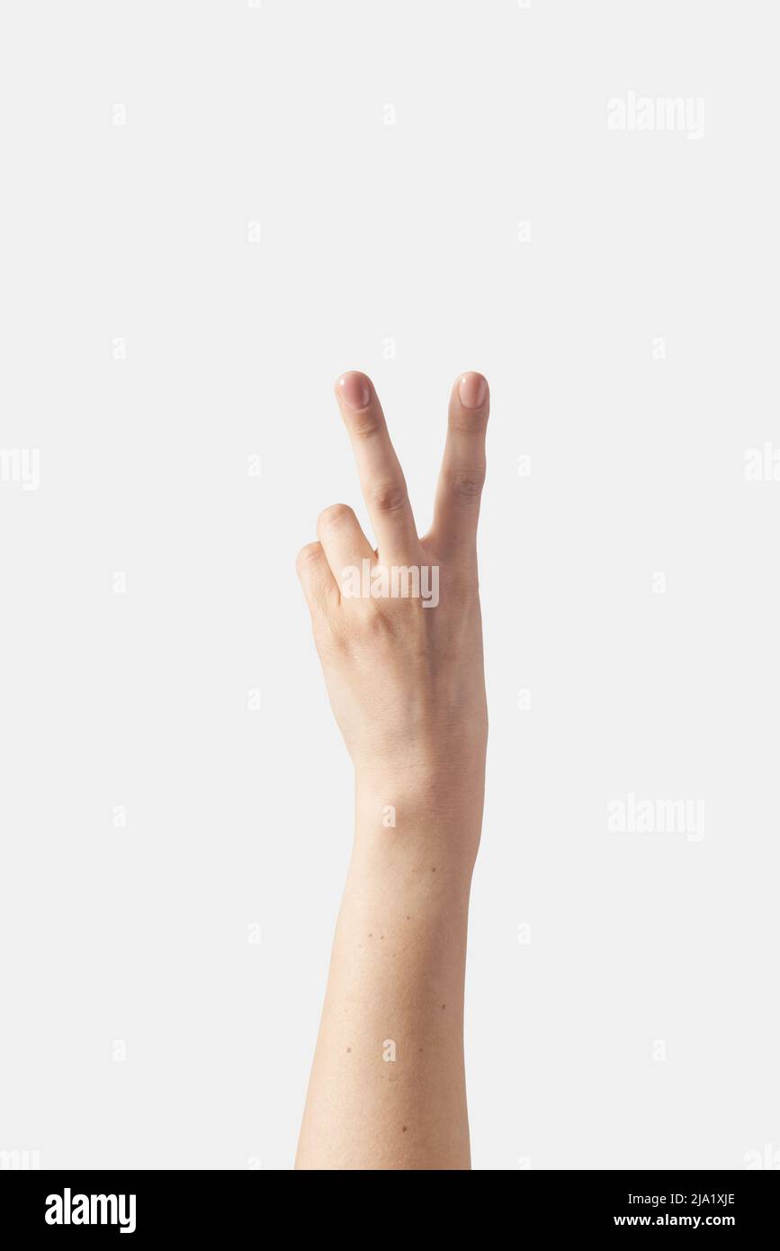 Counting on fingers, five back hand Stock Photo - Alamy