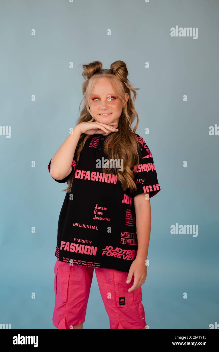 fashion teenager portrait. tween school girl with orange makeup wearing ...