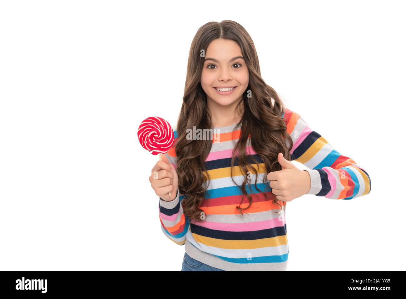 kid in colorful sweater hold lollypop. sugar candy on stick. caramel ...