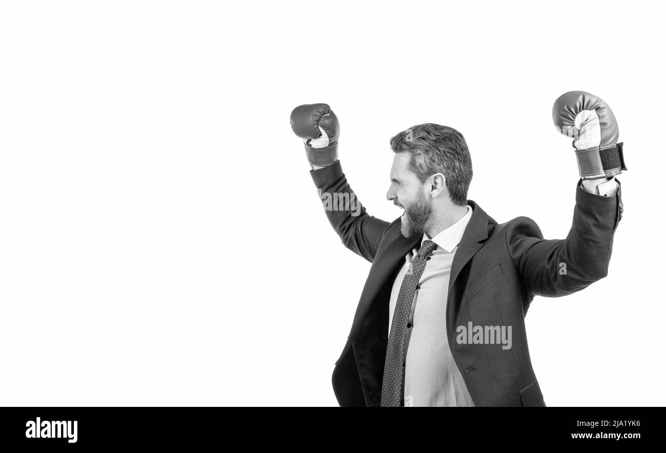 Commitment to success. Professional man raise hands in boxing gloves ...