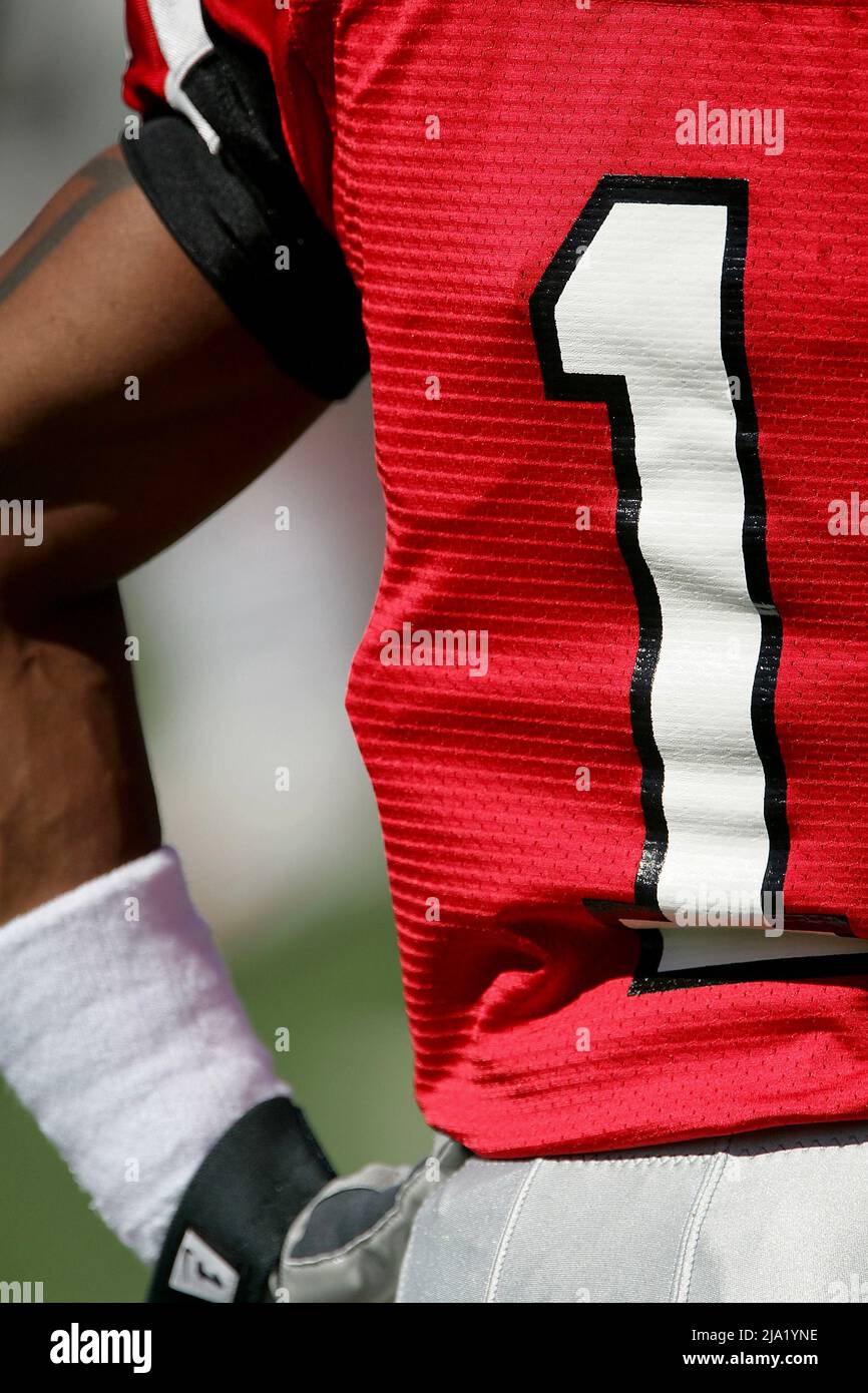 A close up of the back of a sports jersey with the number one Stock ...