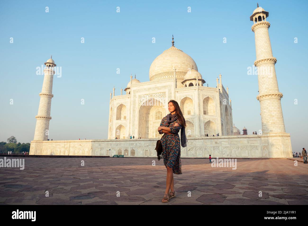 young girl tourist looking to the Taj Mahal in Agra, India . concept of ...