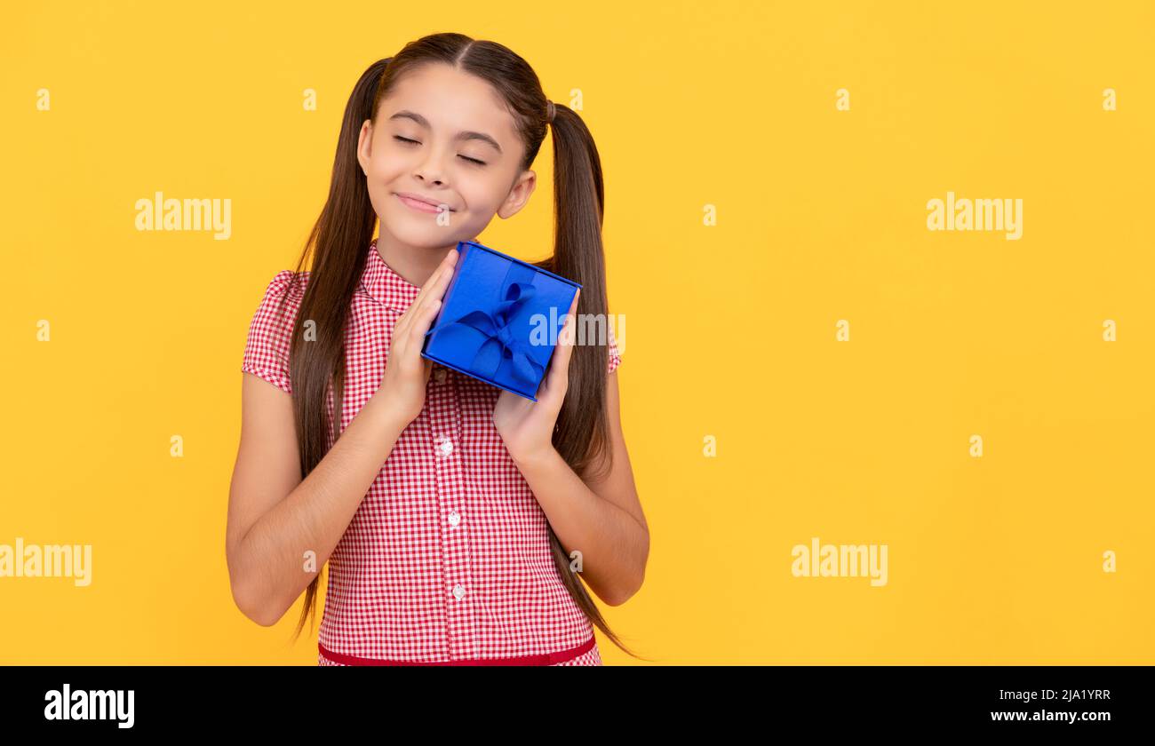 child prepare for holidays. dreamy kid with gift box. happy birthday ...