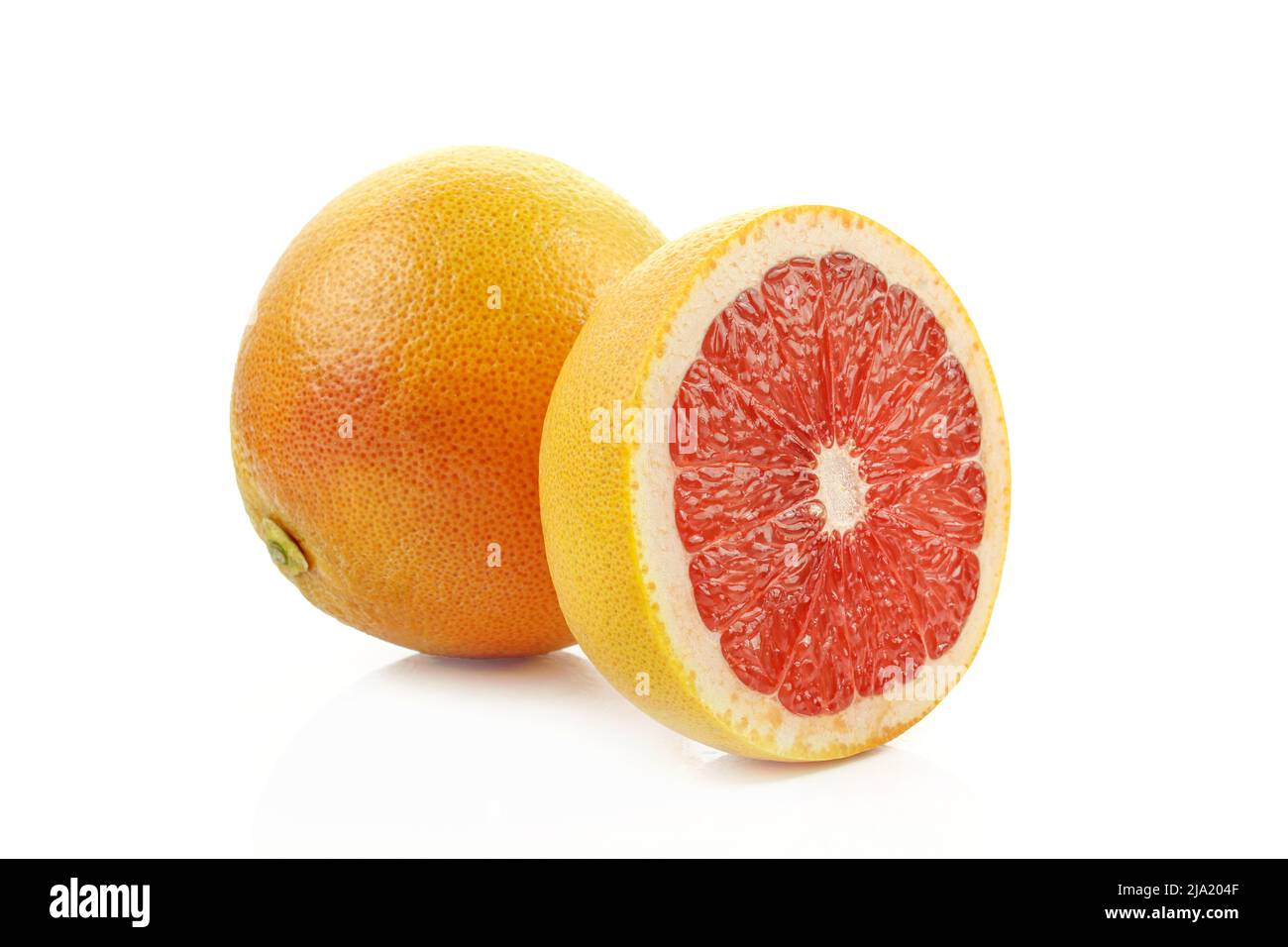 Whole and sliced grapefruit isolated on white background Stock Photo ...