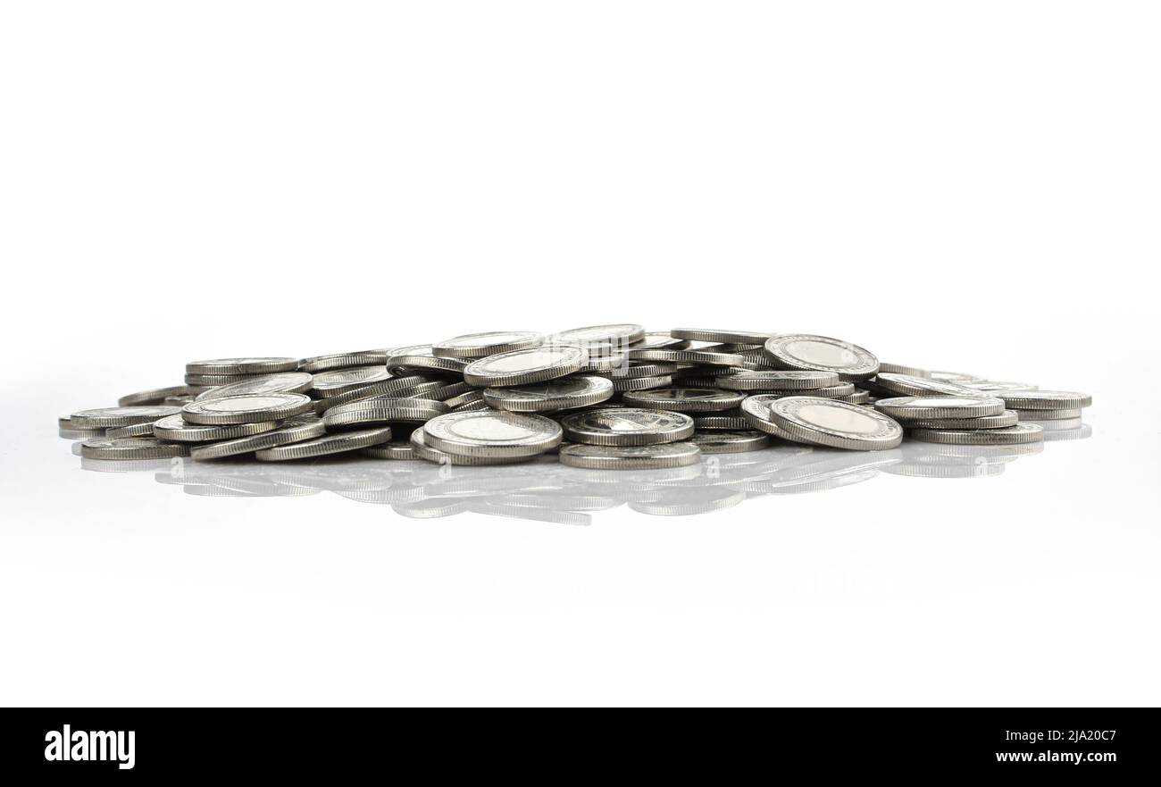 Pile of silver coins isolated on white background. Money heap and ...