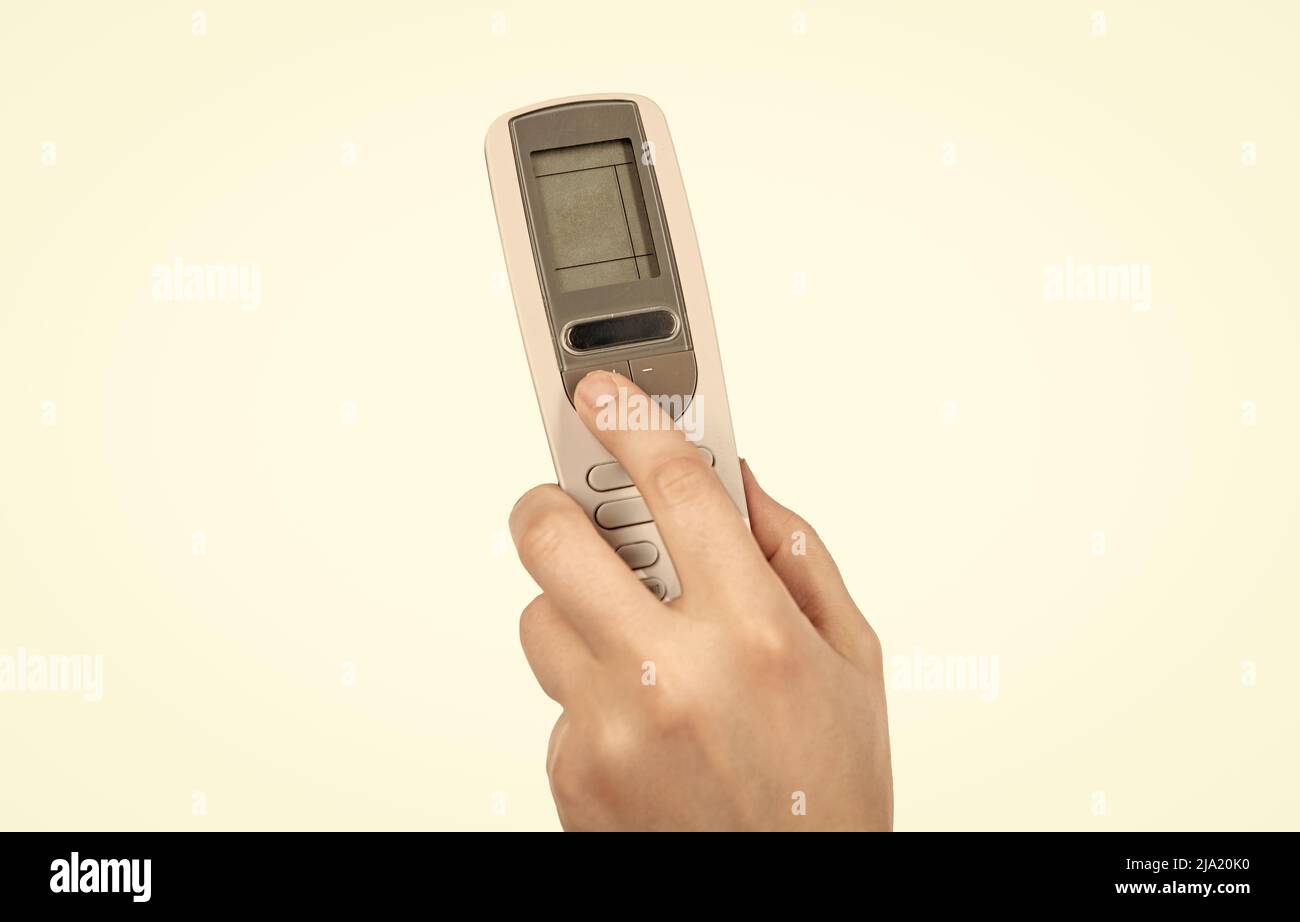 hand pressing button on remote control isolated on white background ...