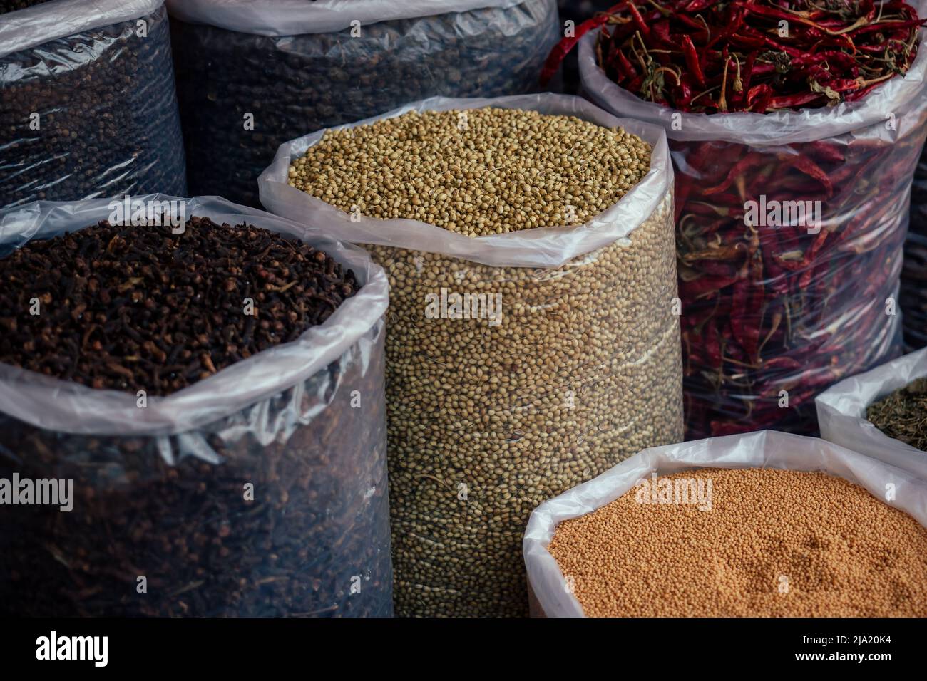 counter with Chinese and Indian spices on the market Stock Photo - Alamy