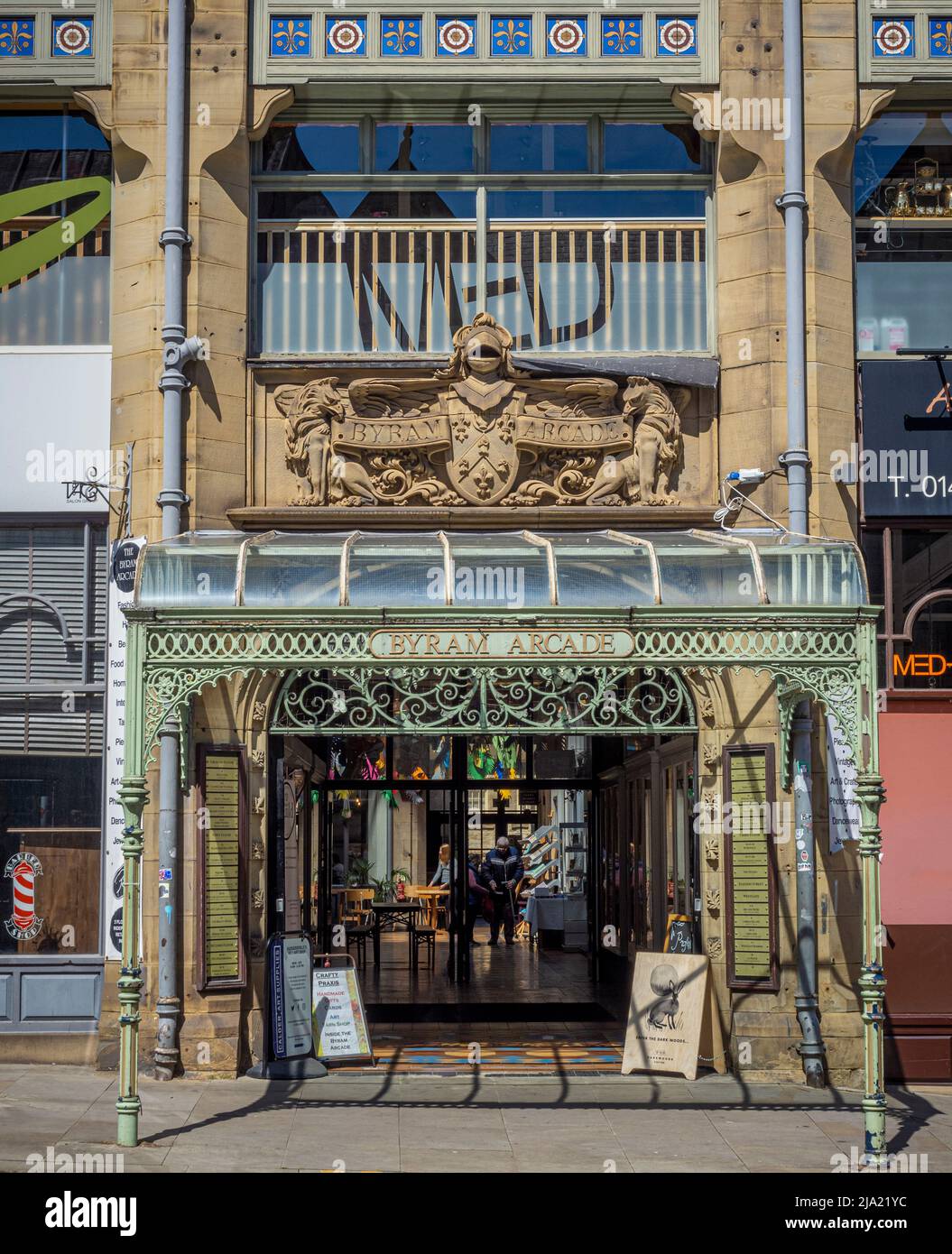 Cast iron glazed canopy over the entrance to the Byram Arcade on ...