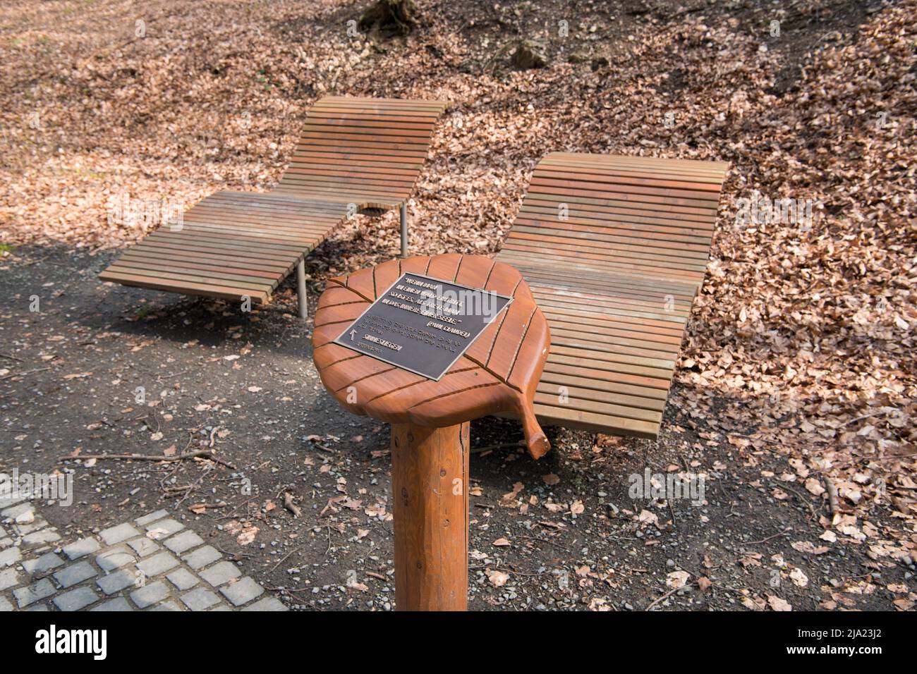 Relaxation loungers along the path, with tactile information boards ...