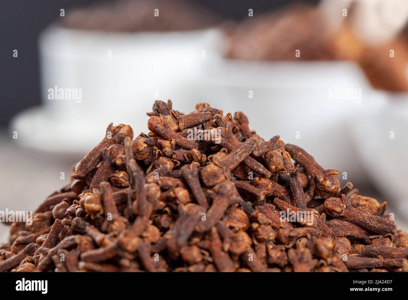 dried aromatic spices of cloves on the table, spices of cloves used for ...