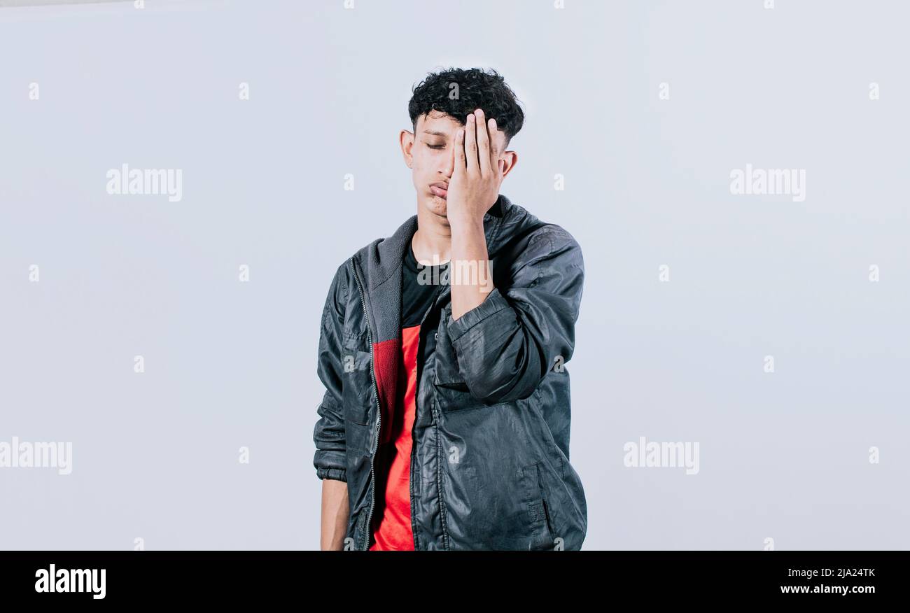 Tired and distressed people covering his face with his palm, Concept of ...