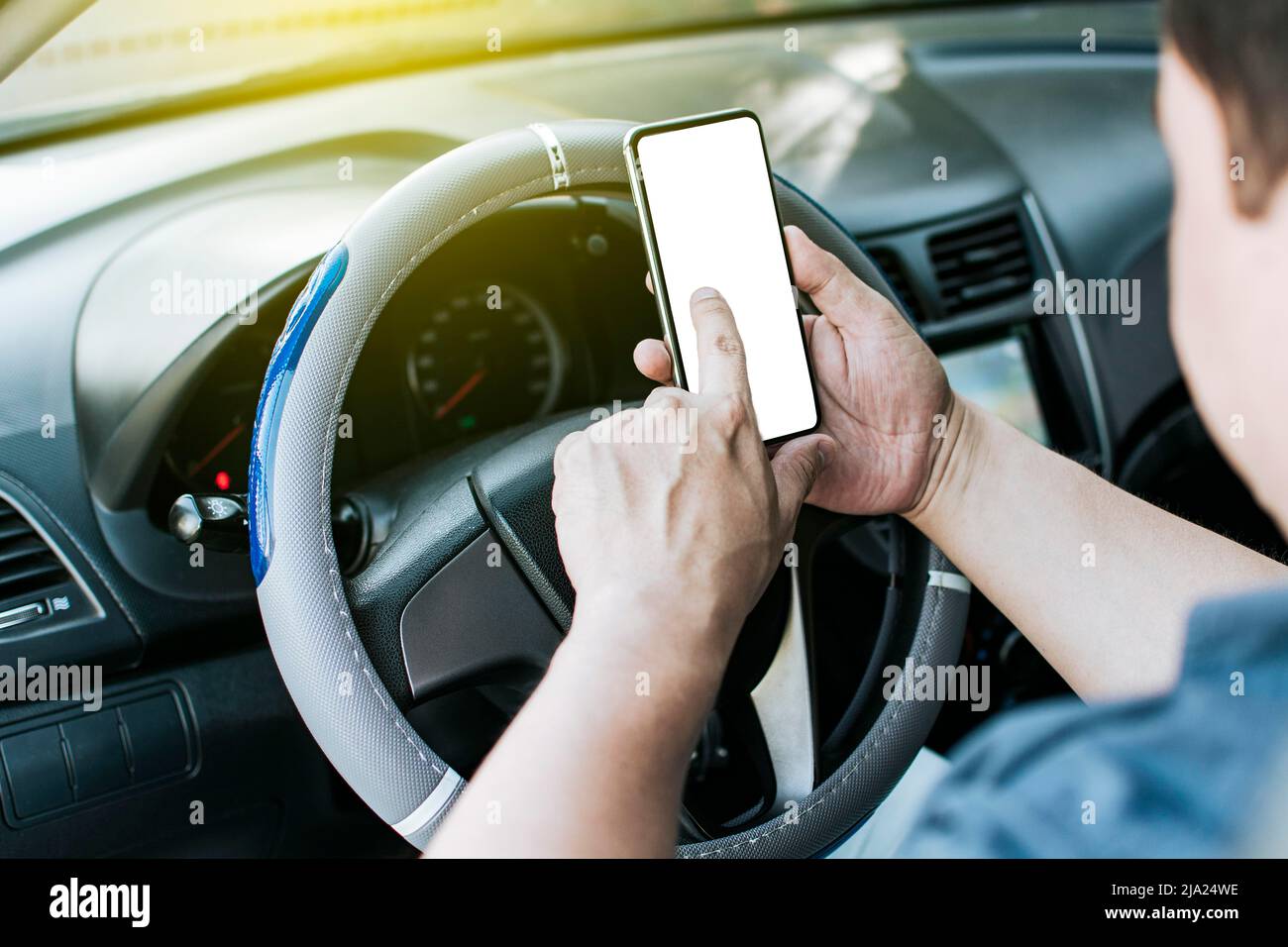 Close up of driver hands using his phone, Person in his car using cell ...