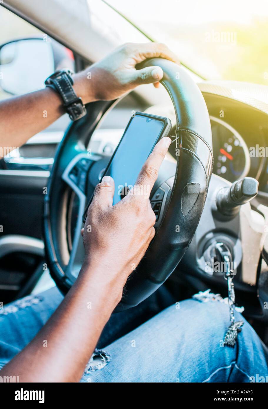Close up of driver hands using his phone, Concept driver hands touching ...