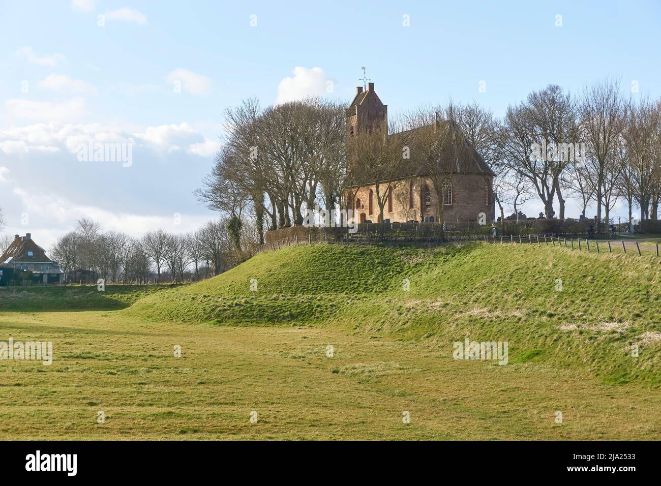 12th century church on top of the historic mound or terp of Hegebeintum ...